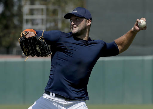 Tim Tebow Takes a Swing at Baseball | Sports